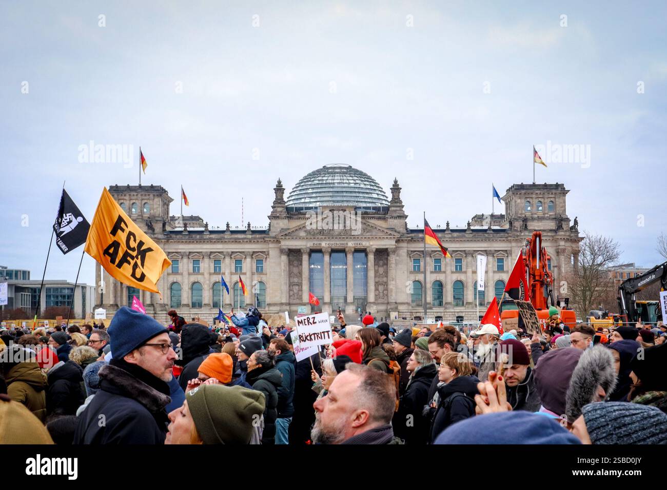 Berlin, Germany - February 2, 2025: Activists wave protest signs at an ...