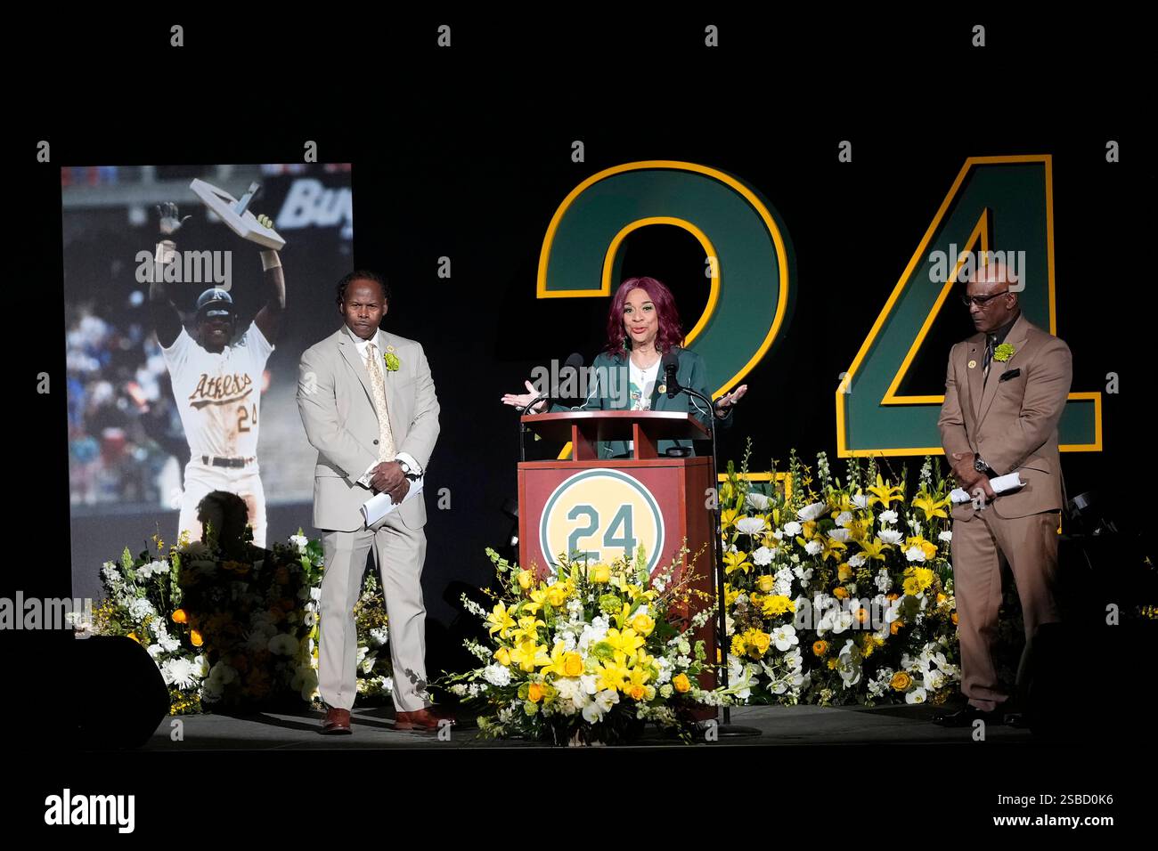 Renel Brooks-Moon, middle, speaks between Bip Roberts, left, and Shooty ...