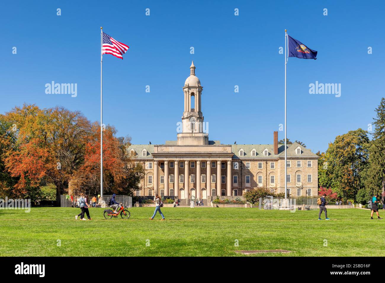 The Old Main building on the campus of Penn State University in autumn ...