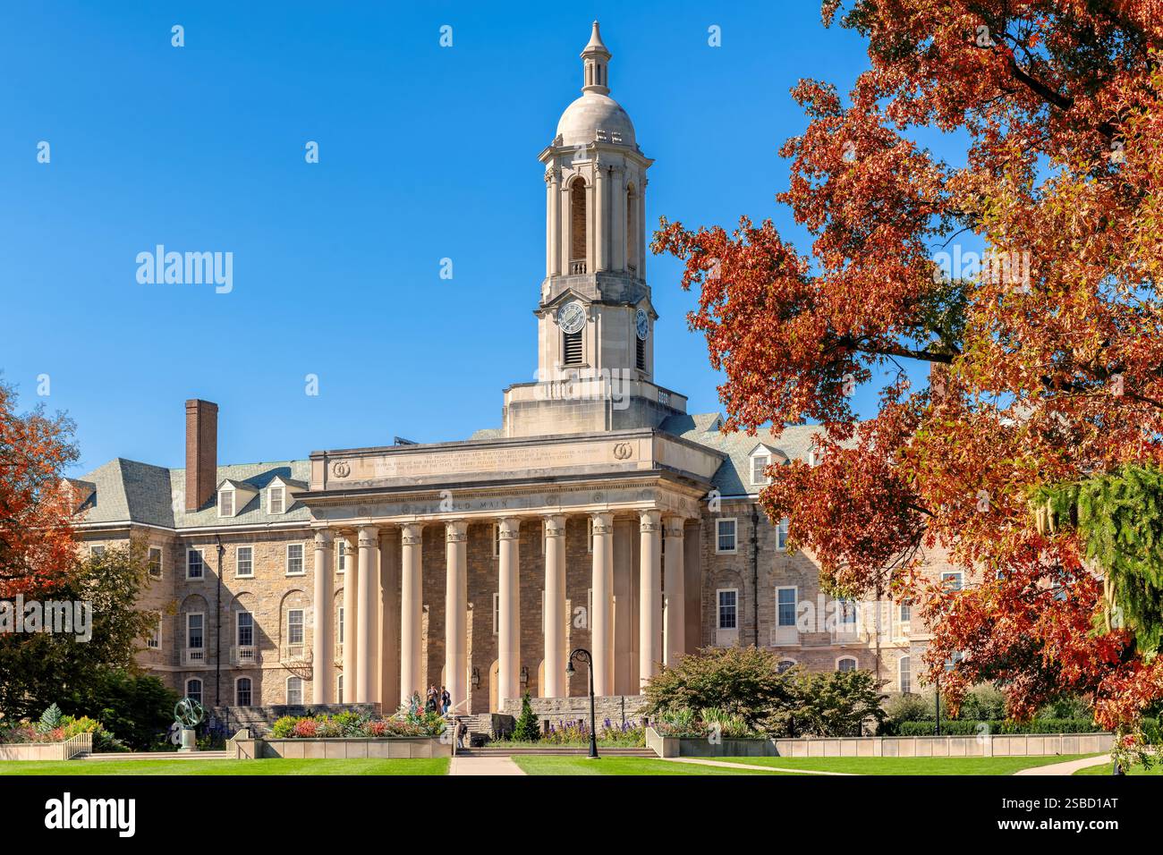 The Old Main building on the campus of Penn State University in autumn ...