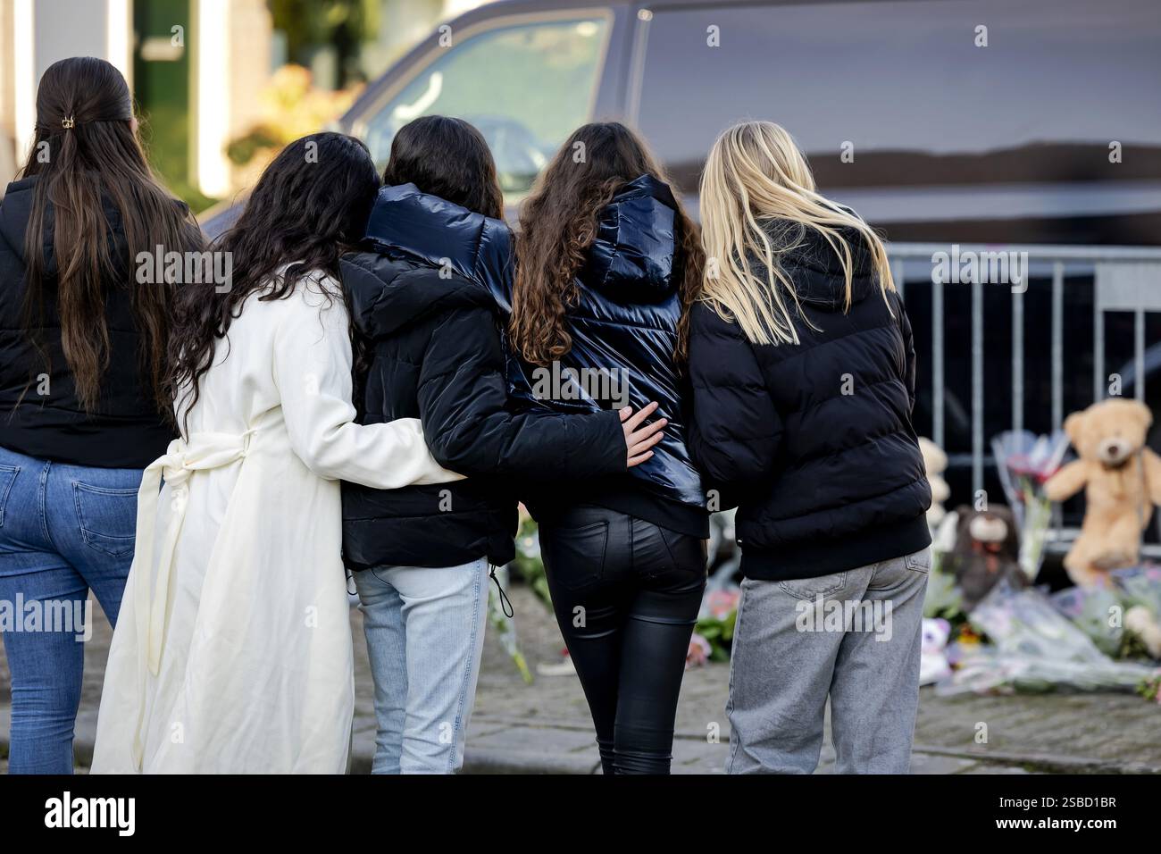 NEWEGEIN - Girls seek comfort at the spot where an 11-year-old girl was ...