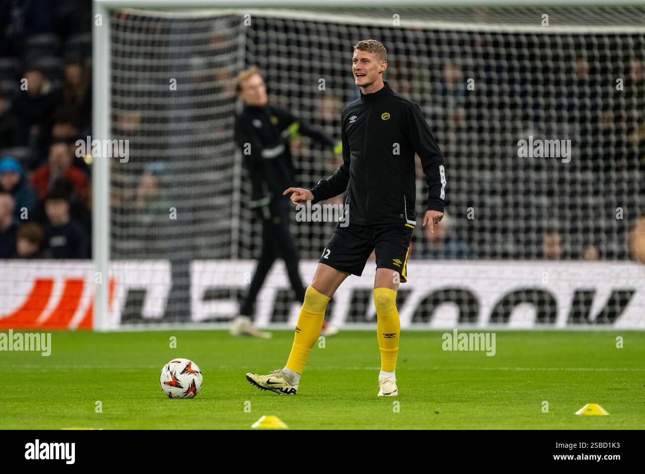 London, England. 30th, January 2025. Emil Holten of Elfsborg is warming ...