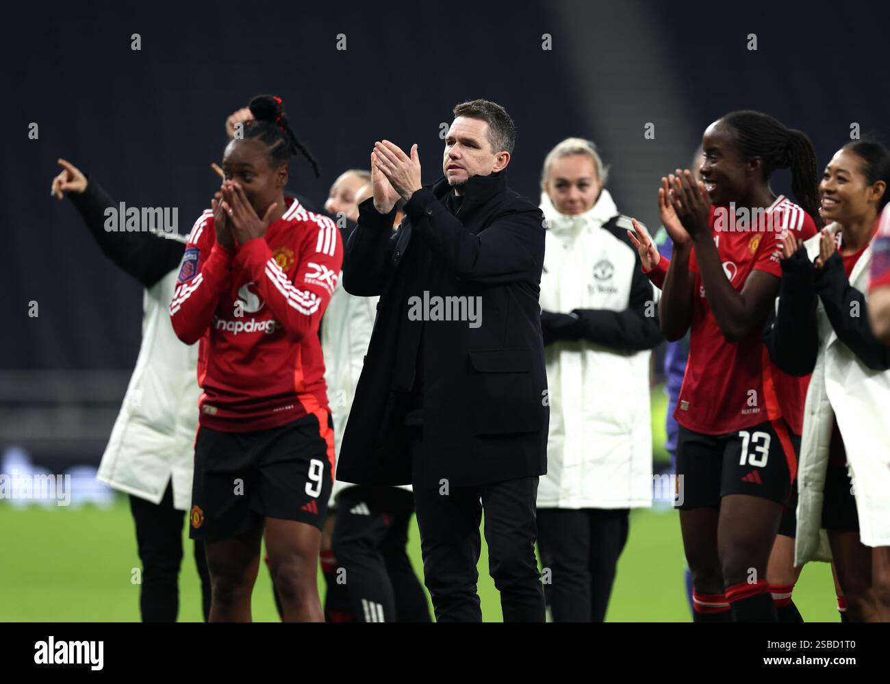 Manchester United manager Marc Skinner applauds the fans following the ...