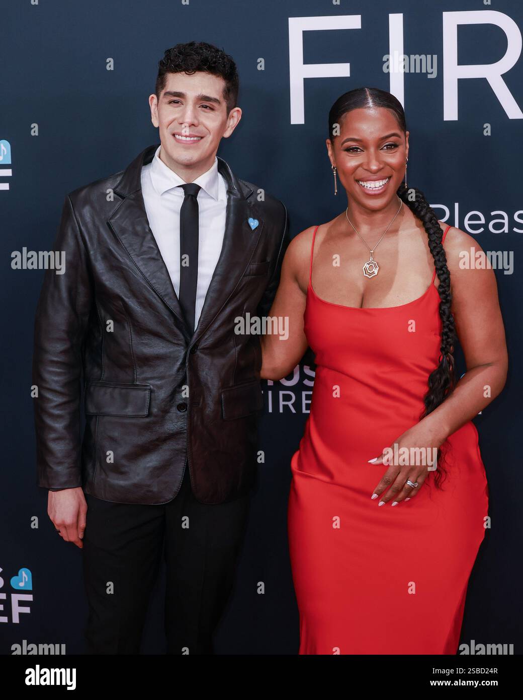 Janine Rubenstein and Patrick Gomez walking on the red carpet during ...