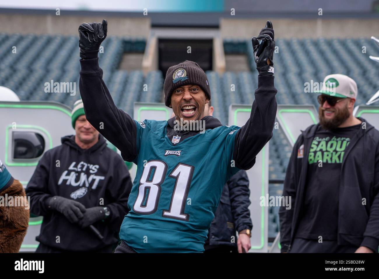 Philadelphia Eagles fan and digital creator King Gillie, center, dances ...