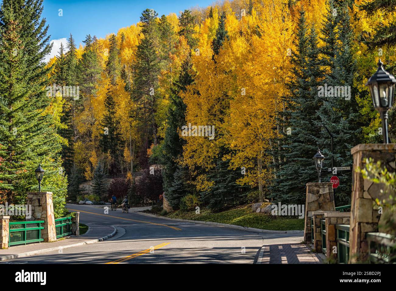 Bridge road footbridge over Gore creek in Vail, Colorado in colorful ...