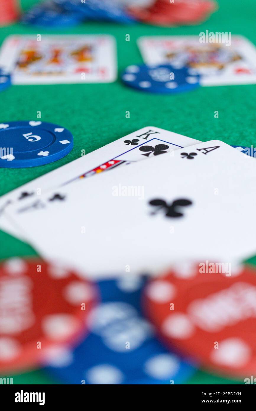 Close-up of an ace and king of clubs, a strong starting hand in poker ...