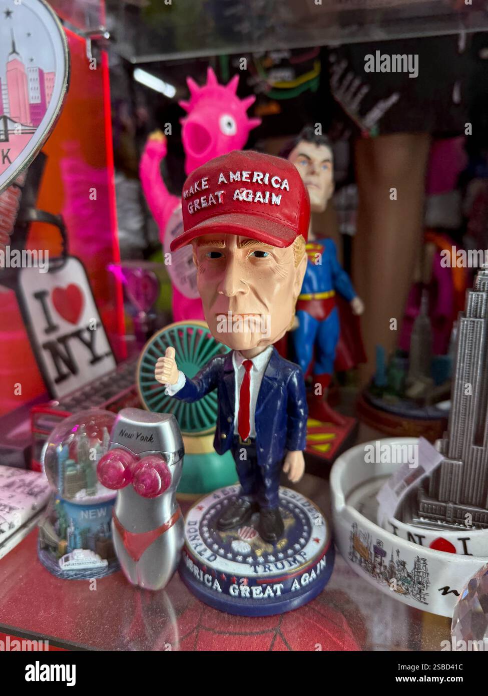 President Donald Trump doll with Superman over his left shoulder in the ...