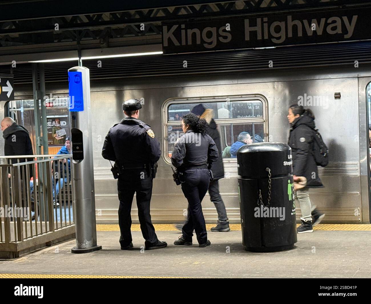 Police presence on the elevated subway platform at Kings Highway along ...