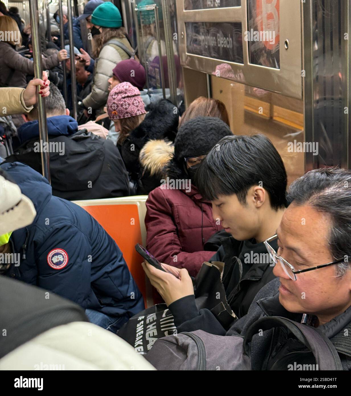 Crowded subway train car on the weekend in Manhattan, New York City ...