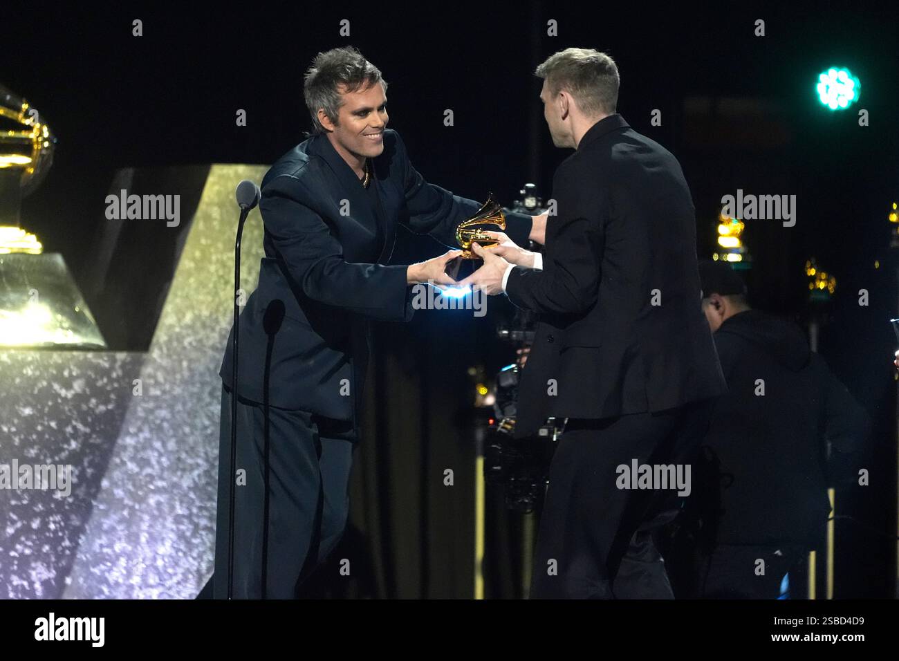 Finn Keane, left, accepts the award for best dance pop recording for ...