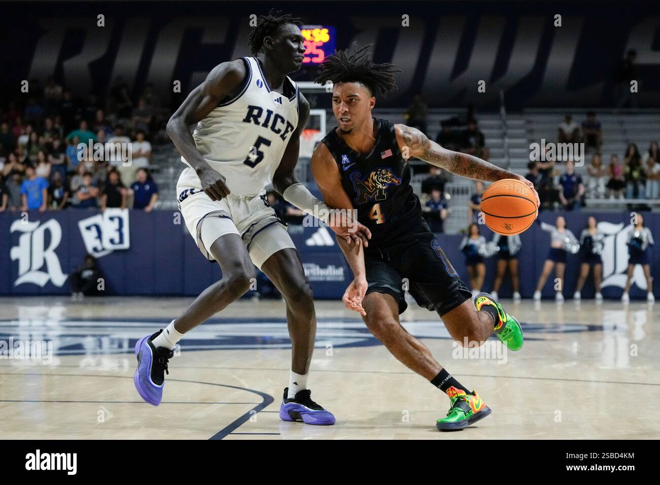 Rice guard Jacob Dar (5) defends against Memphis guard PJ Haggerty (4 ...