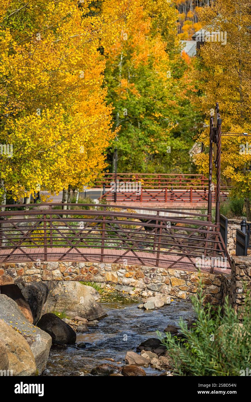 Fairy tale bridge footbridge with creek river in Beaver Creek, Colorado ...