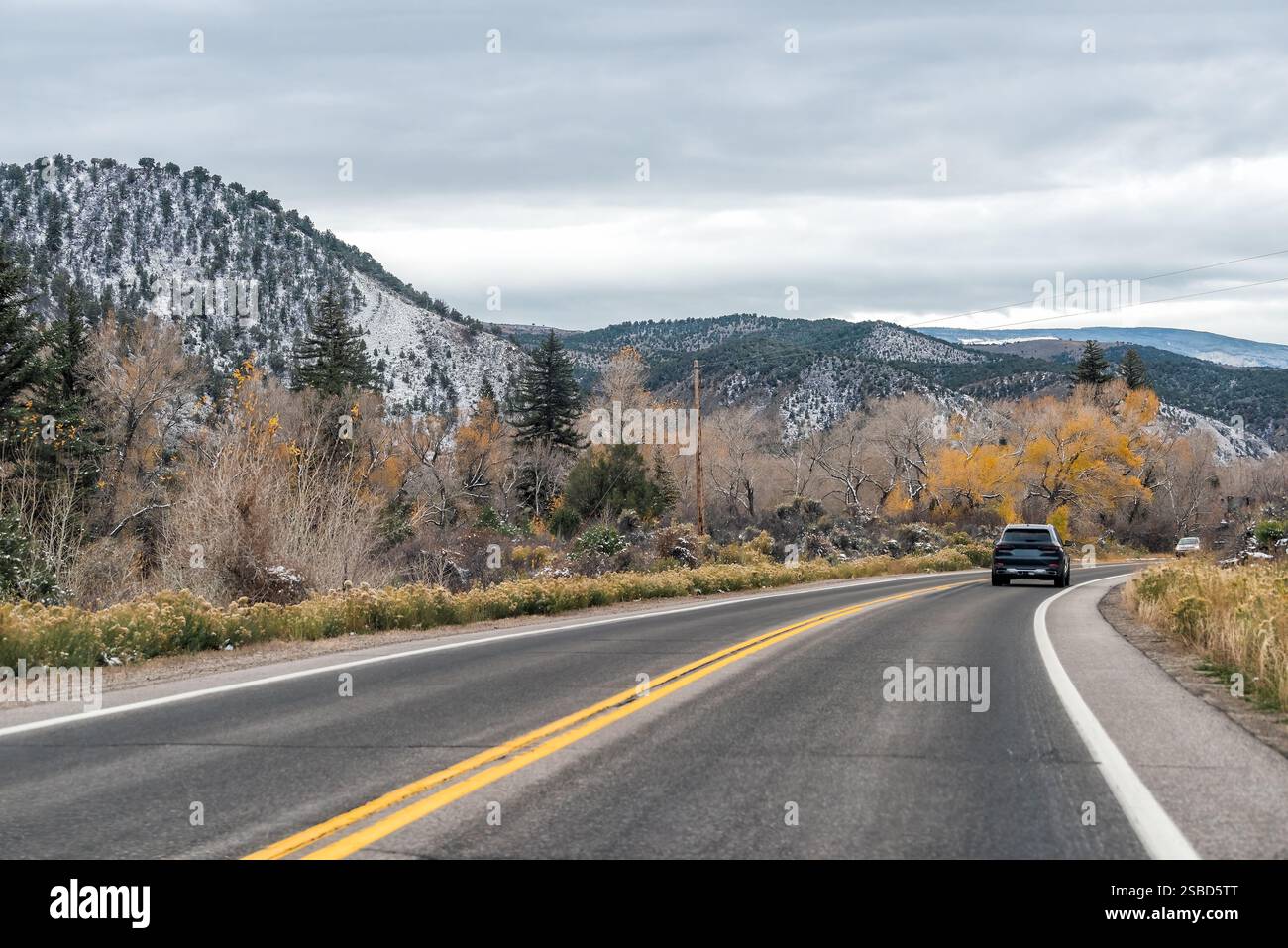 Eagle county, Colorado snow covered cliff mountains on cloudy day ...