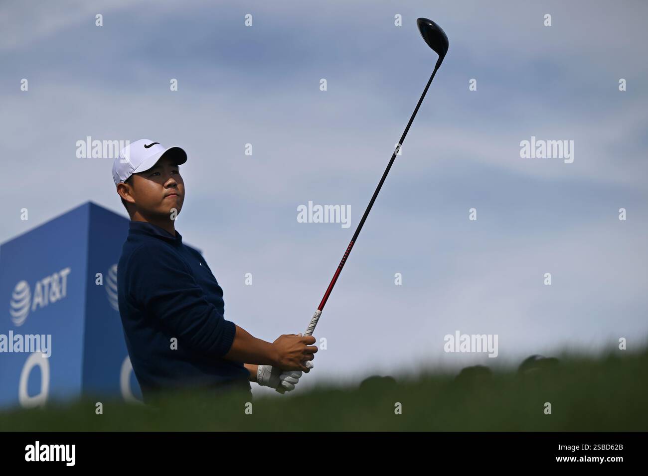 Tom Kim hits from the ninth tee at Pebble Beach Golf Links during the ...