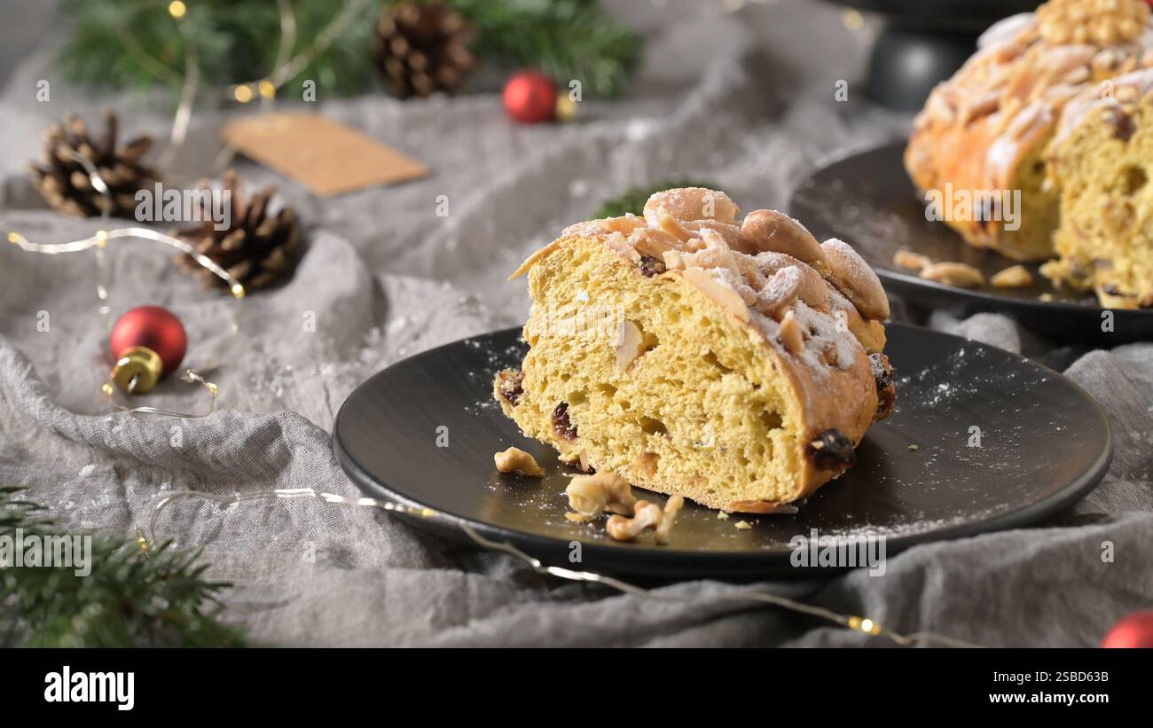 A slice of Bolo Rainha, a traditional Portuguese sweet bread, dusted ...