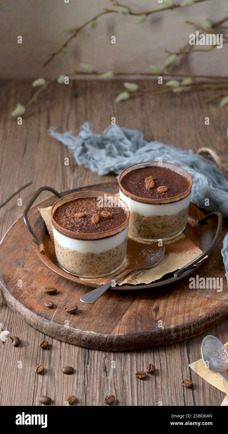 Two delicious tiramisu overnight oats in clear glass containers ...