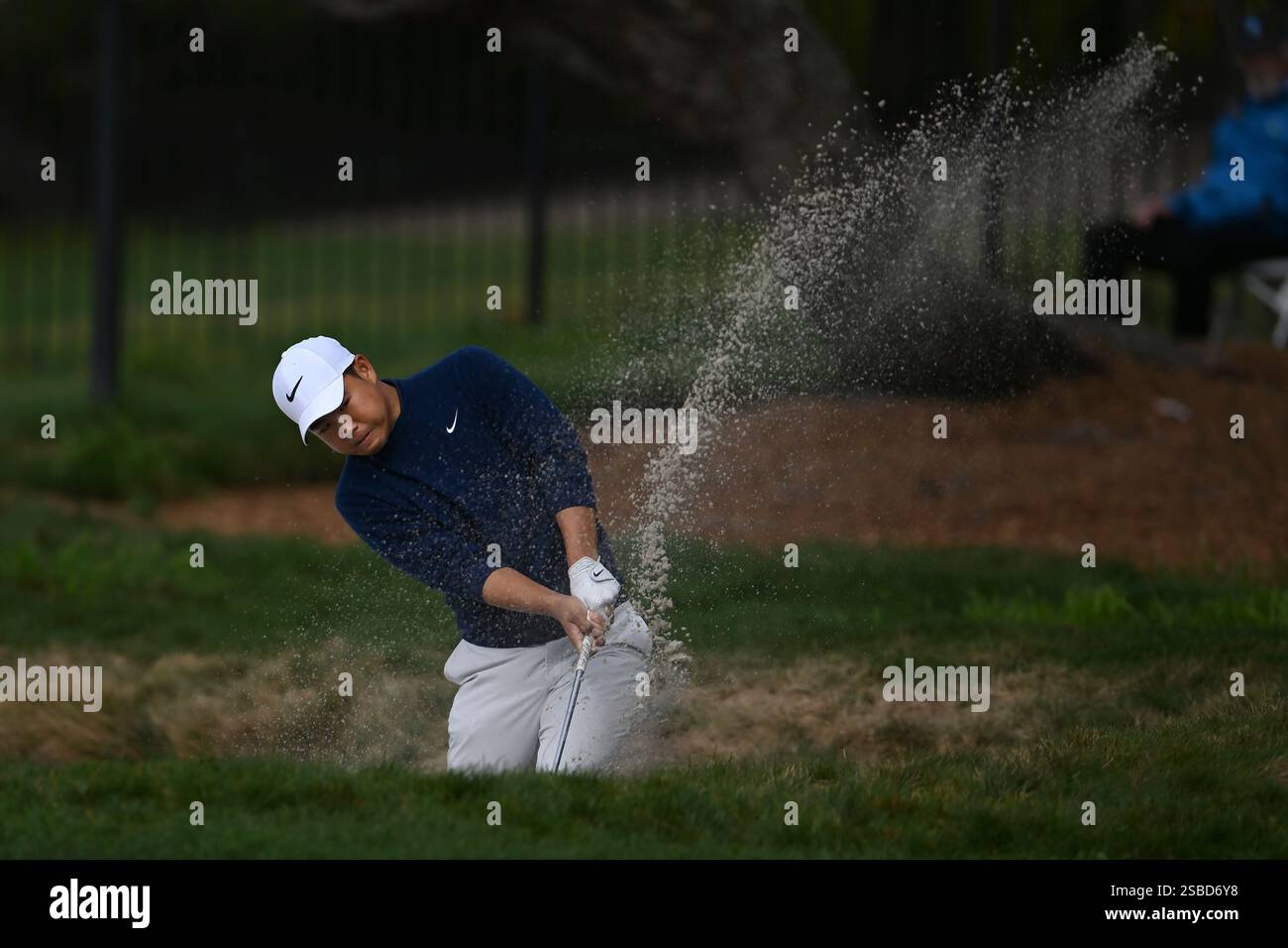 Tom Kim hits to the first fairway at Pebble Beach Golf Links during the ...