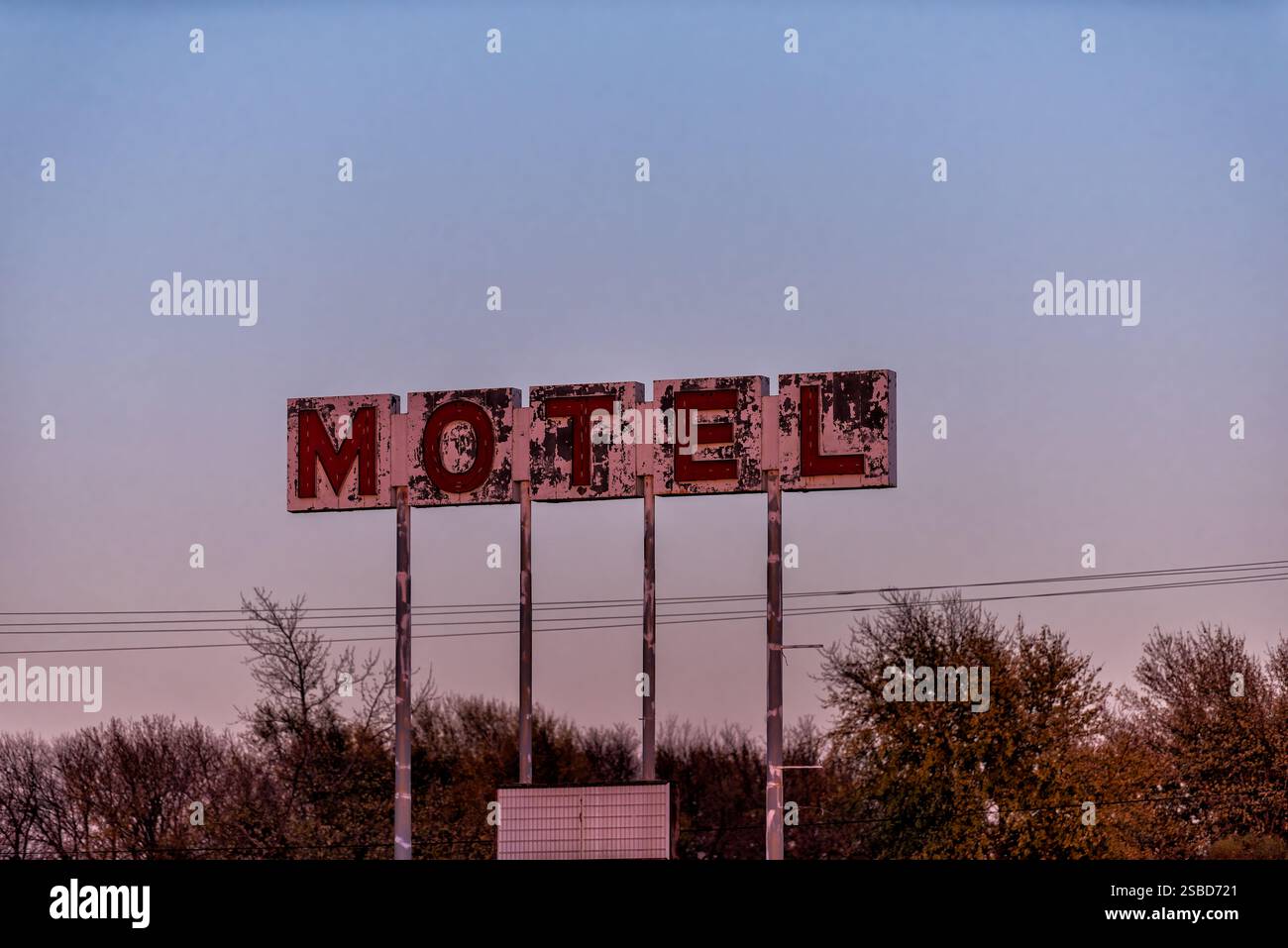 Rural midwest America in Kansas at sunset twilight with old sign for ...