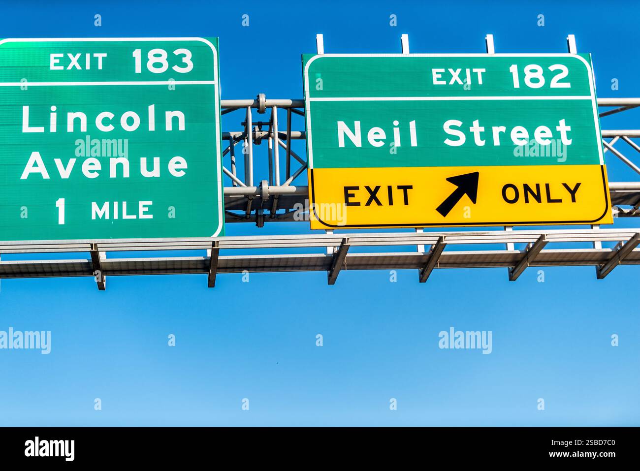 Highway interstate road in Illinois with sign text for exit in Urbana ...