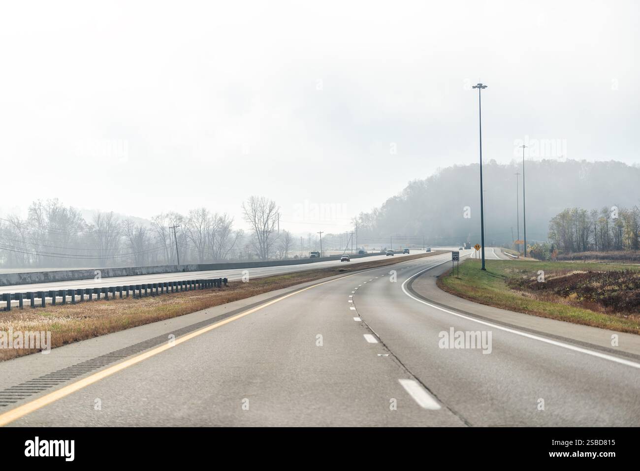 Highway 33 east road in fog on foggy morning near Columbus Ohio with ...