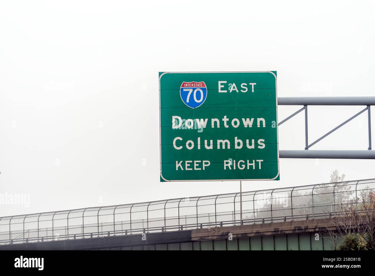 Columbus, Ohio interstate highway 70 road with fog mist and sign for ...