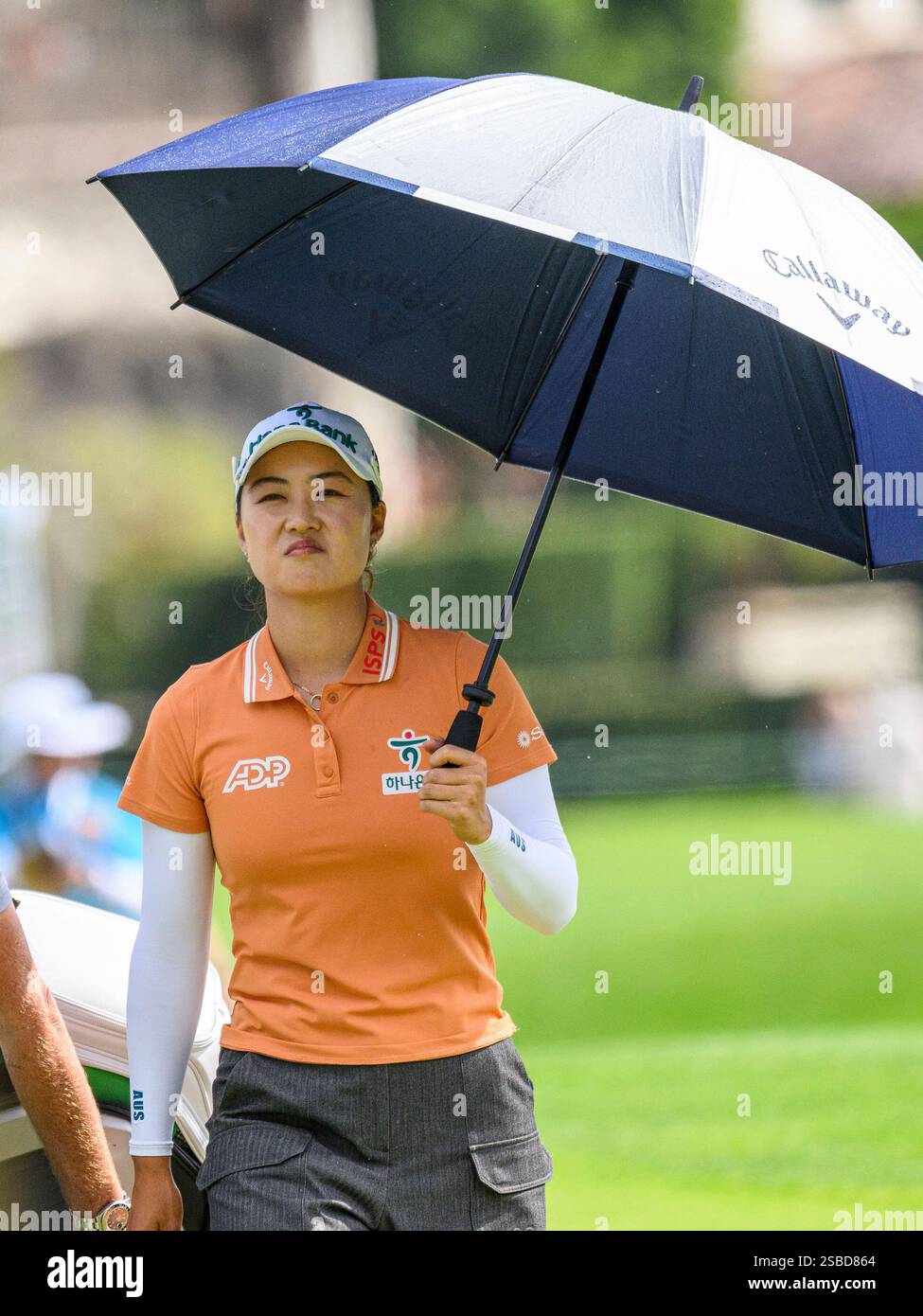 February 2, 2025: Mingee Lee of Australia walks up to the 18th green ...