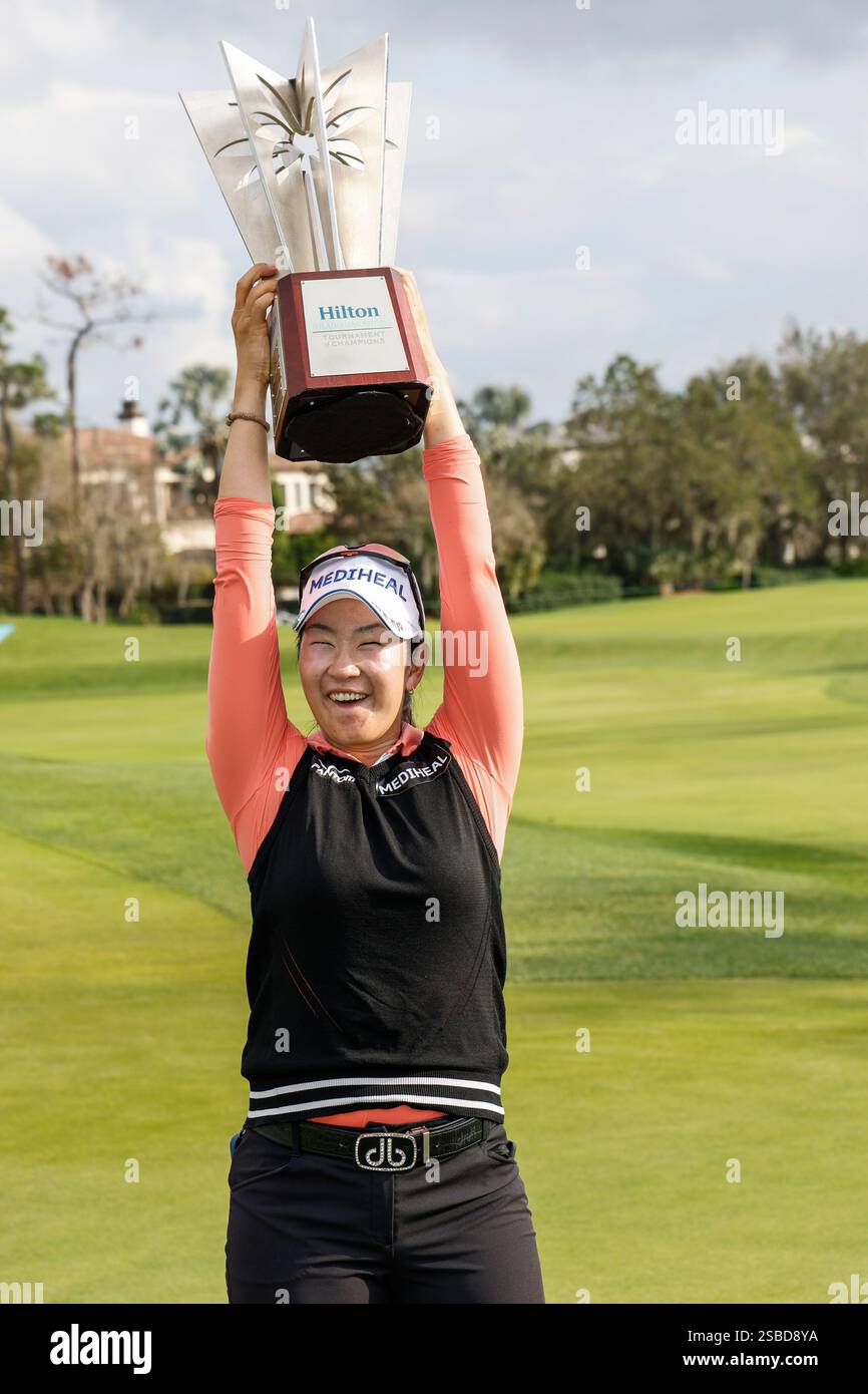 A Lim Kim holds the trophy after winning the Hilton Grand Vacations ...