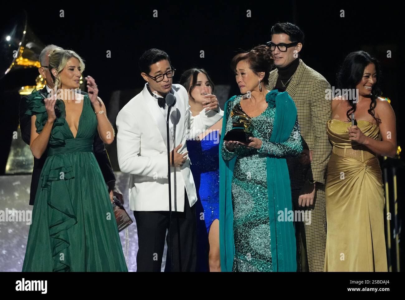 Tony Succar, left, and Mimy Succar accept the award for best tropical ...