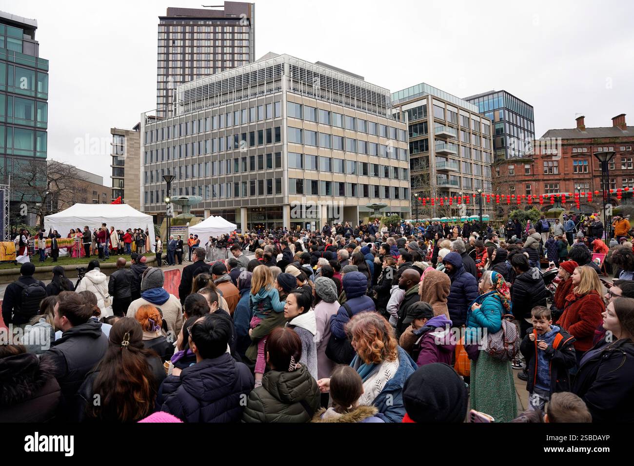Crowds of people watching the Sheffield Lunar Chinese New Year Festival ...