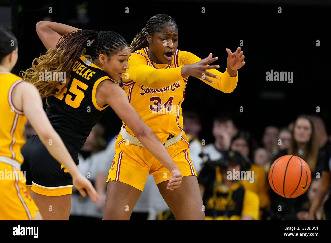Iowa forward Hannah Stuelke (45) tries to steal the ball from Southern ...