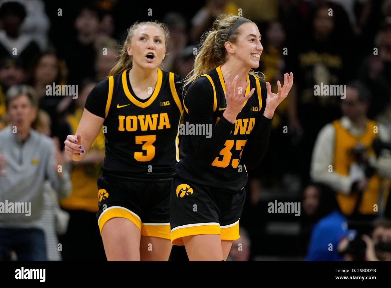Iowa guard Lucy Olsen, right, reacts after a call during the second ...