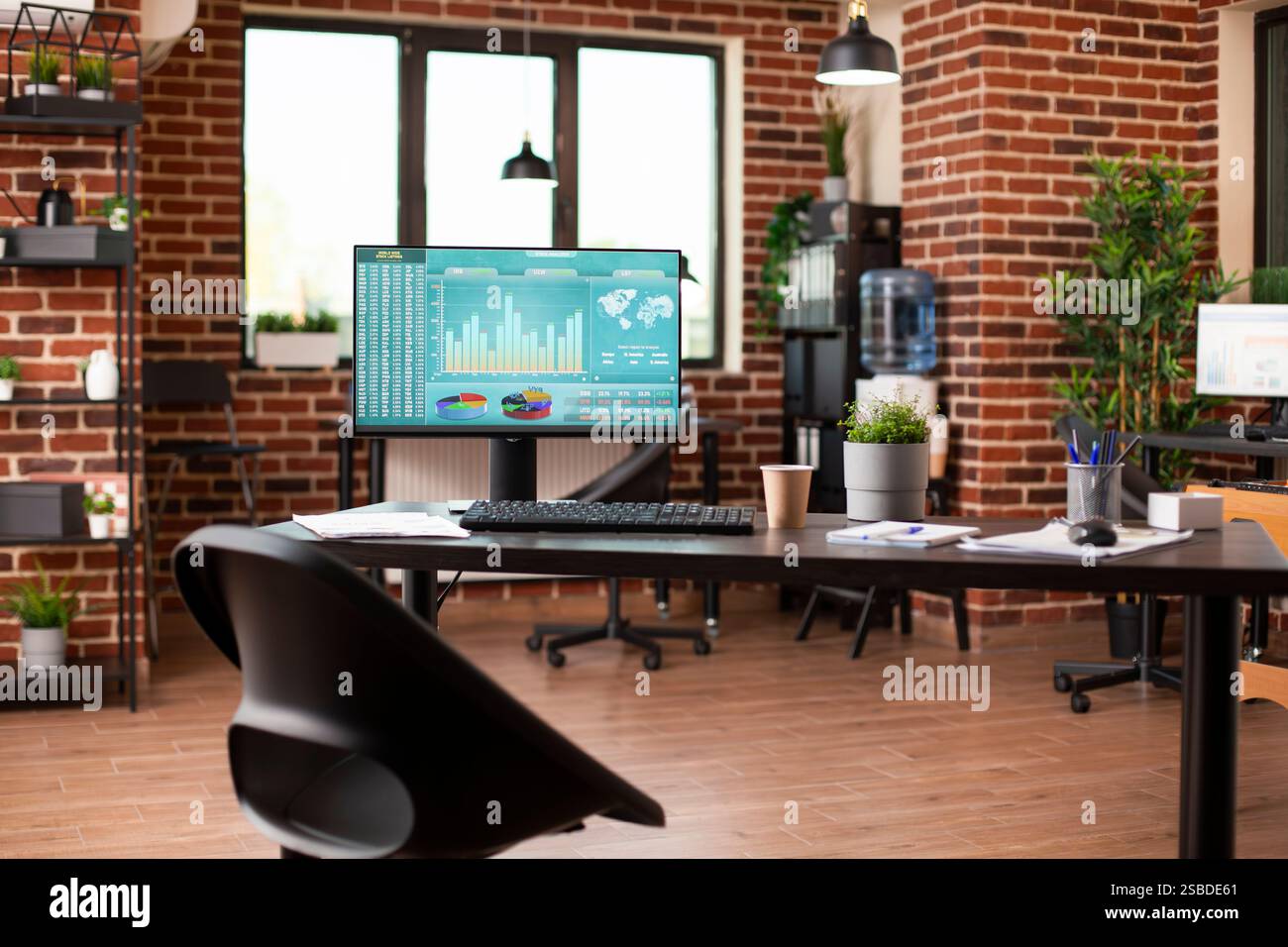 Empty startup office having modern desk with computer monitor ...