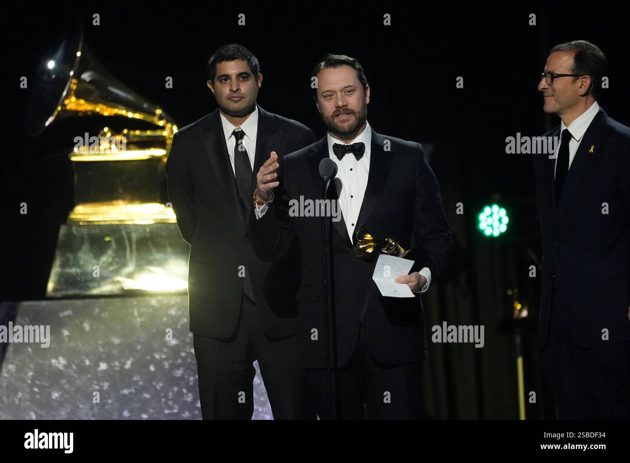 Kabir Sehgal, left, and Jason Carter accepts the award for best ...