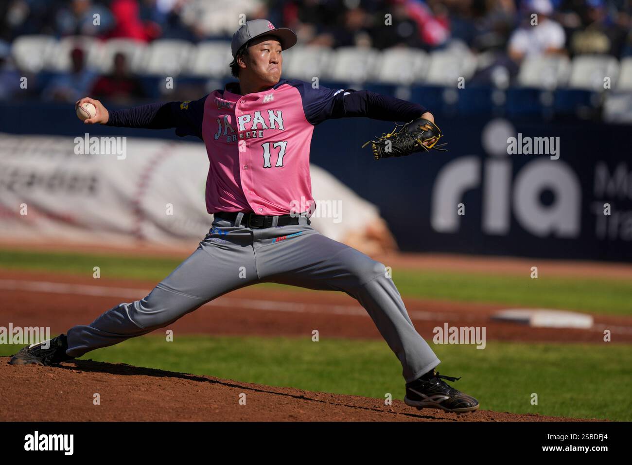 Japan pitcher Isaki Ninomiya throws a pitch against Puerto Rico in the ...