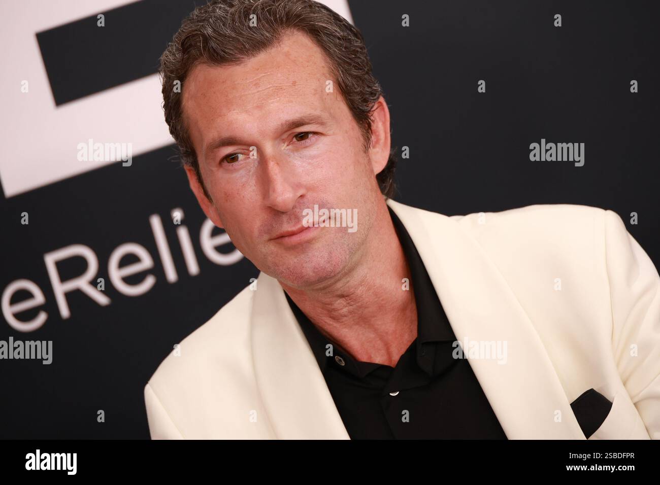 Los Angeles, USA. 02nd Feb, 2025. Aaron Lazar walking on the red carpet ...