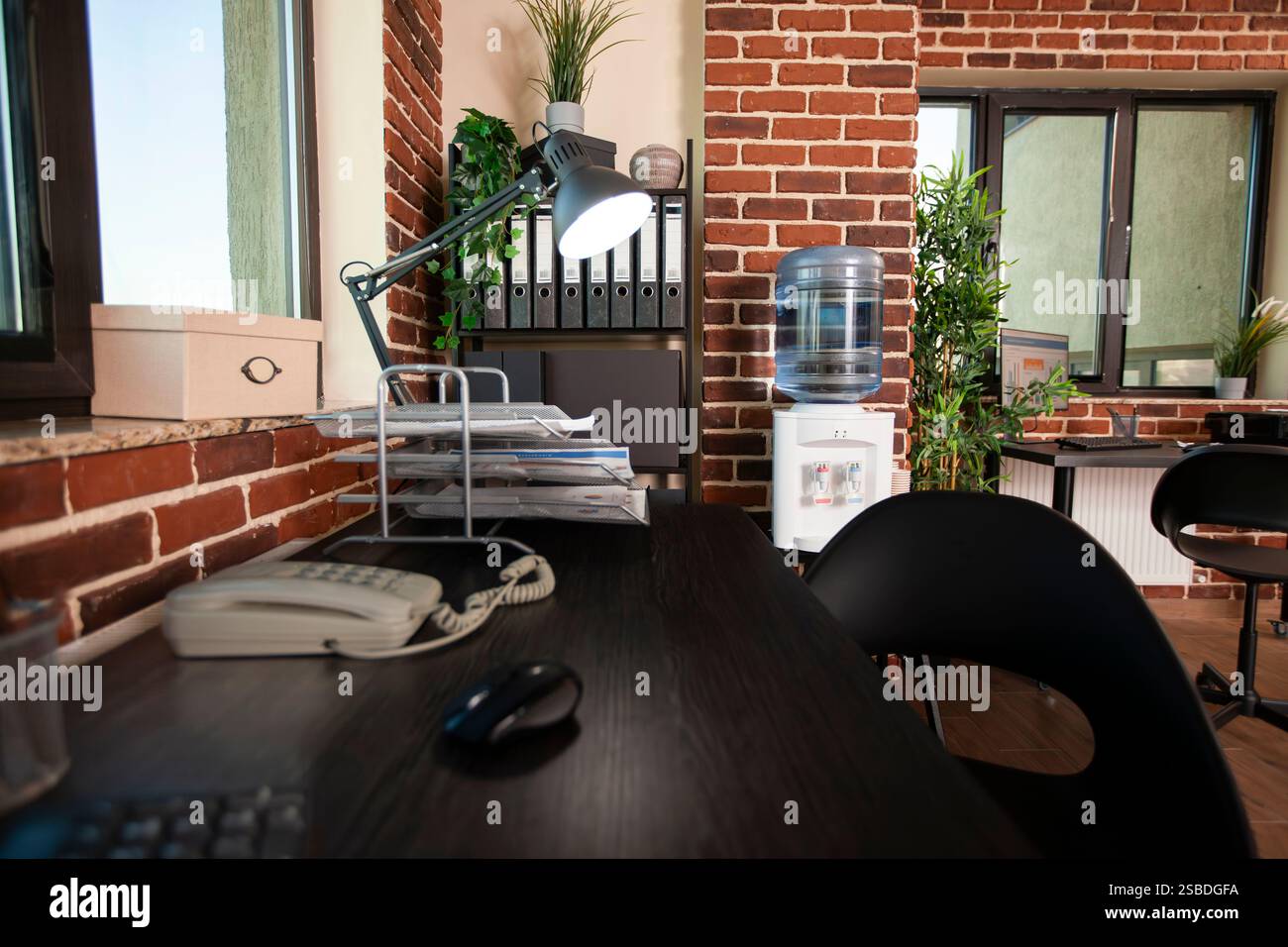 Tidy workspace with clean wooden desk arranged neatly for business ...