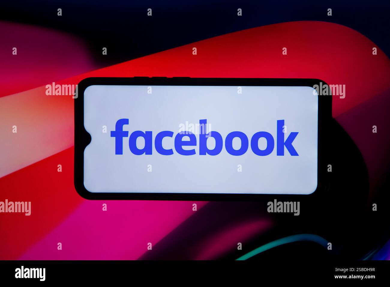 In this photo illustration, the Facebook logo is seen displayed on a ...