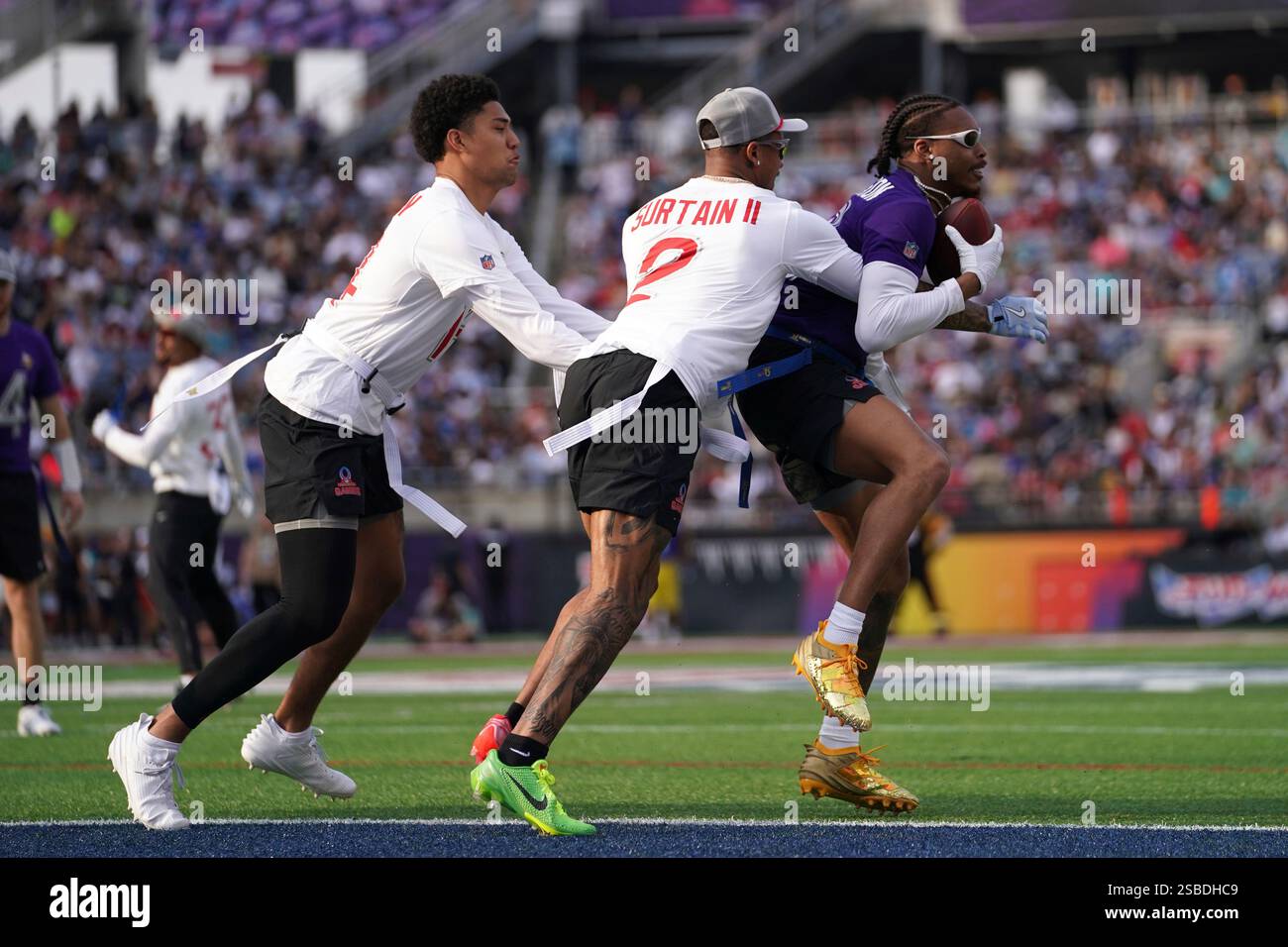 NFC wide receiver Justin Jefferson, right, of the Minnesota Vikings ...