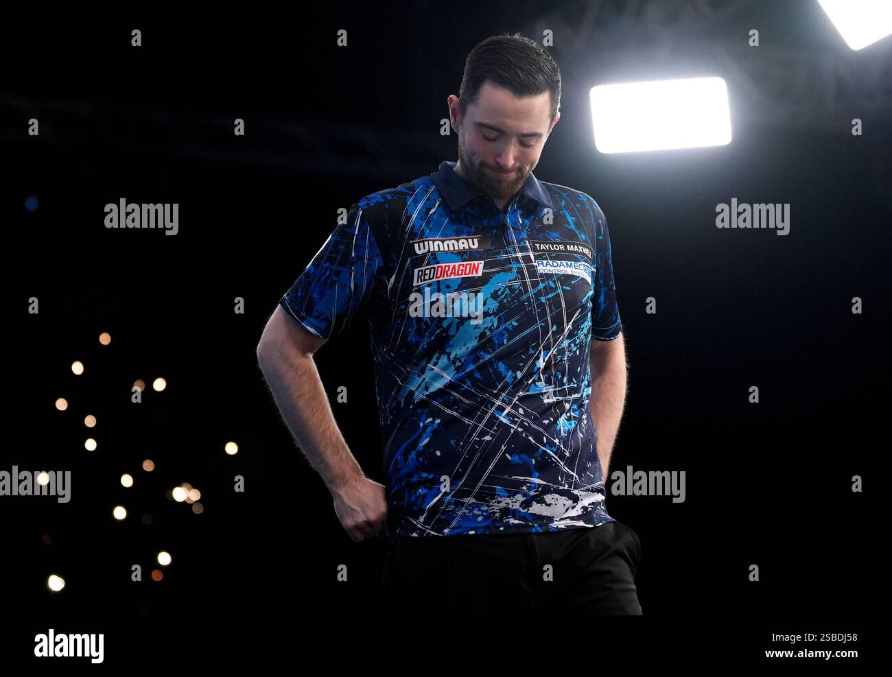 Luke Humphries celebrates after beating Jonny Clayton in the final of ...