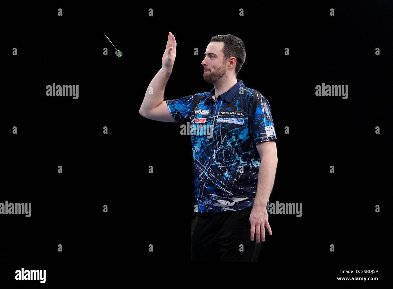 Luke Humphries celebrates after beating Jonny Clayton in the final of ...