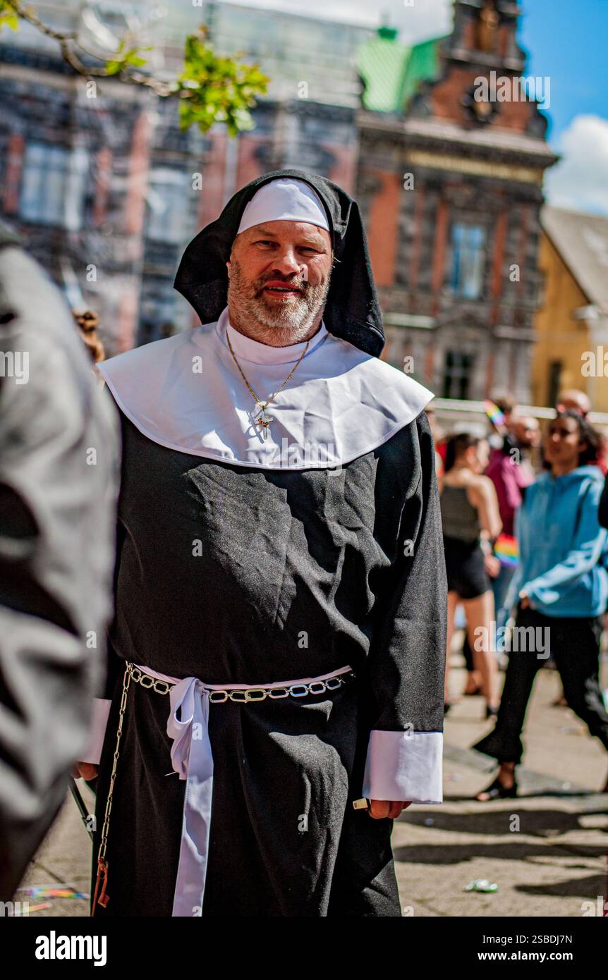 Man dressed as munk Stock Photo - Alamy