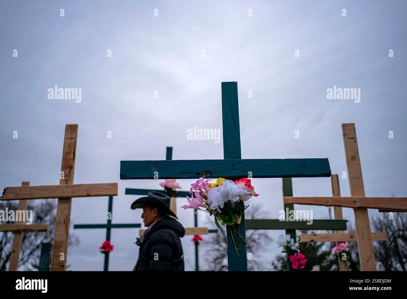 Washington, United States. 02nd Feb, 2025. Artist Roberto Marquez walks ...