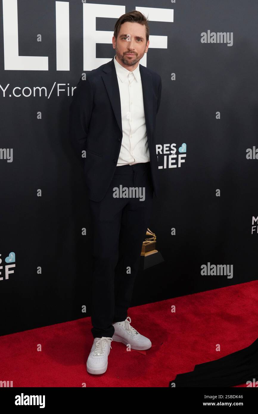 Eric Cha-Beach arrives at the 67th annual Grammy Awards on Sunday, Feb ...