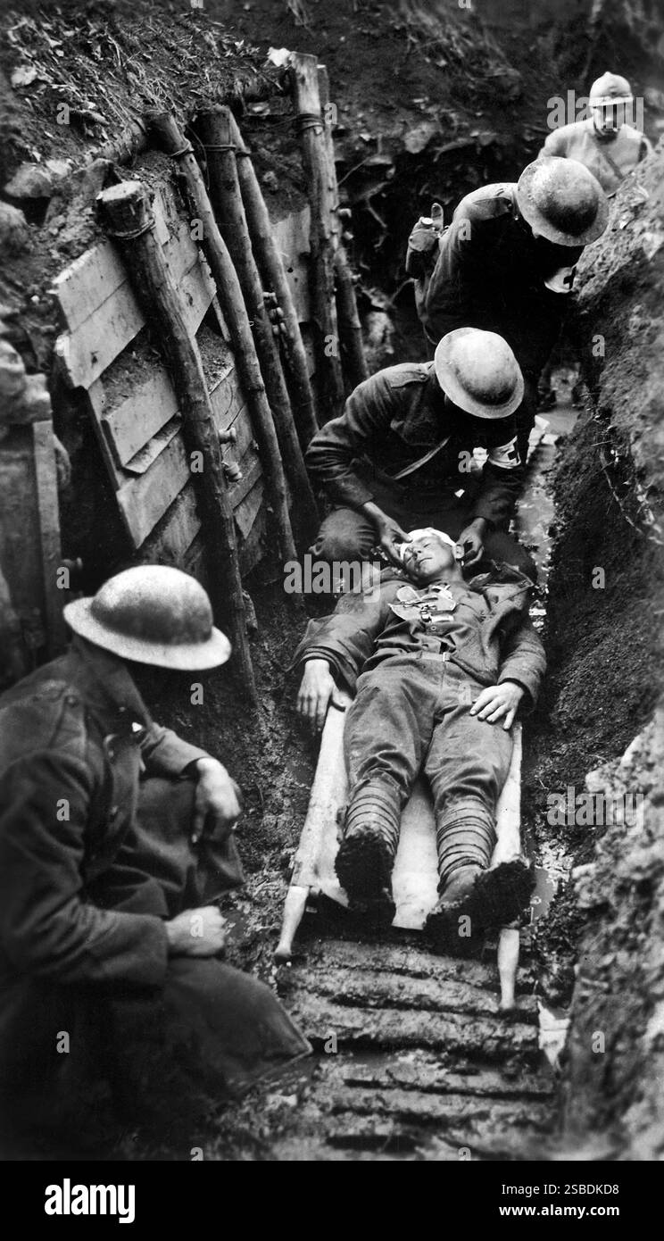 U.S. marine receiving first aid before being sent to hospital in rear ...