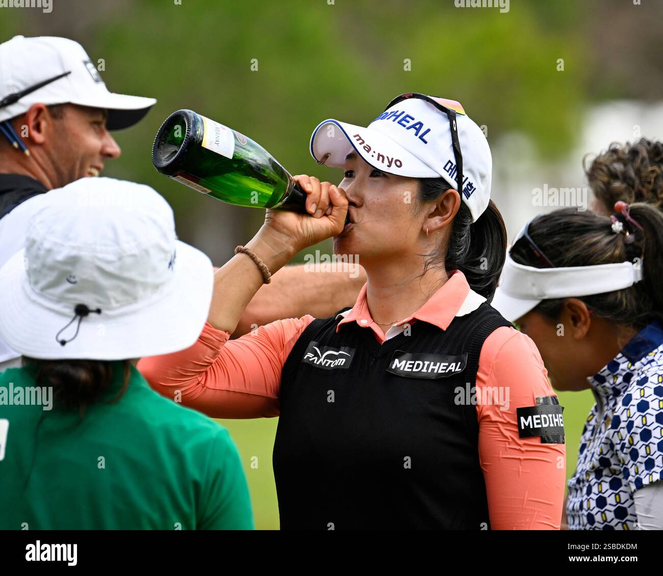 A Lim Kim enjoys some Champagne after winning the LPGA Hilton Grand ...