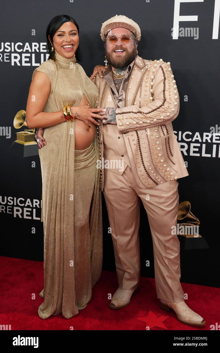 Raiche Wright, left, and Teddy Swims arrive at the 67th annual Grammy ...