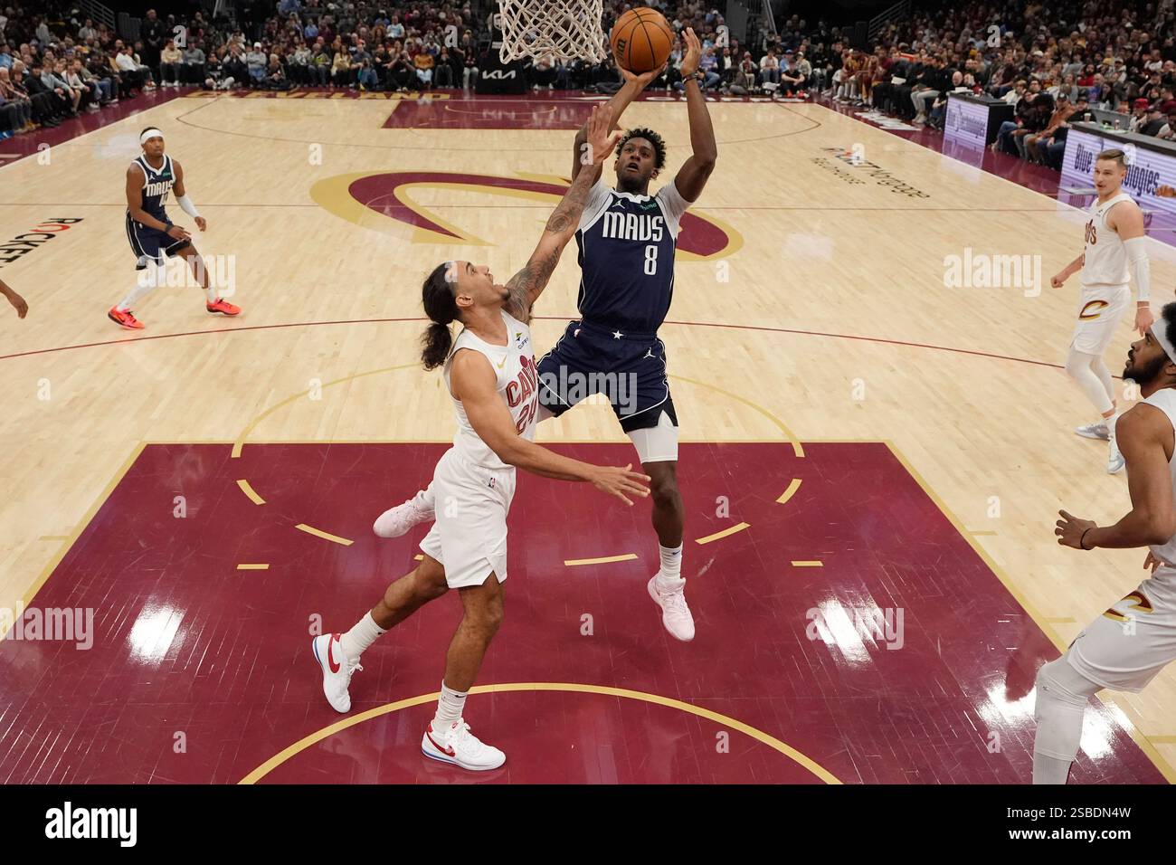 Dallas Mavericks forward Olivier-Maxence Prosper (8) goes up to shoot ...