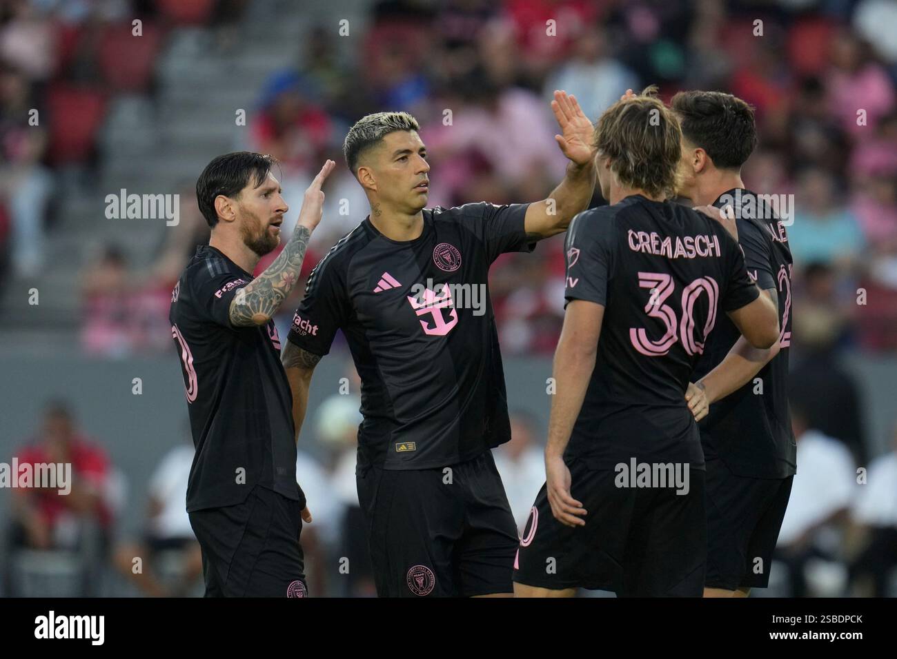 Lionel Messi of the United States' Inter Miami, left, and Luis Suarez ...