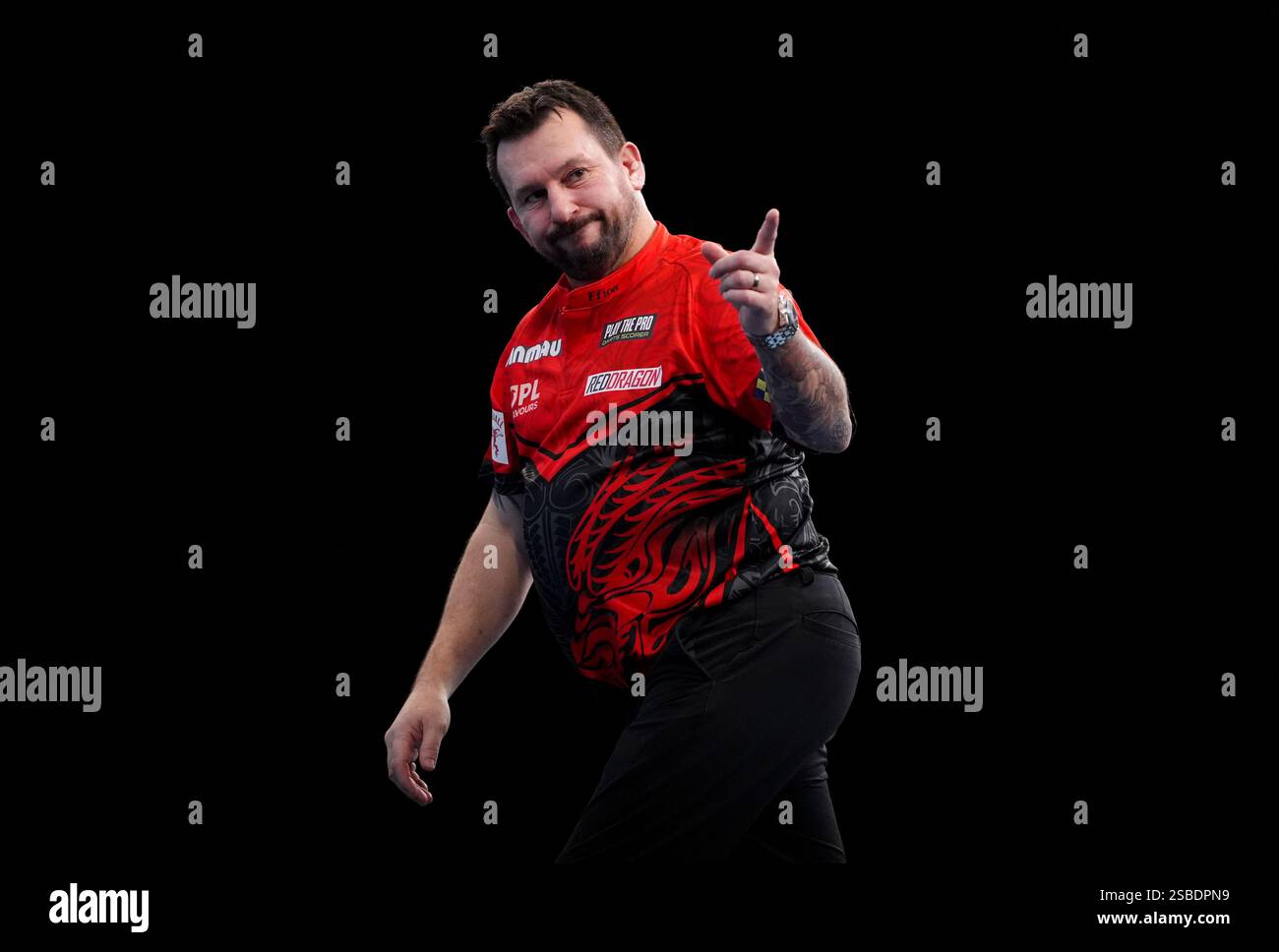 Jonny Clayton celebrates during the final against Luke Humphries on day ...